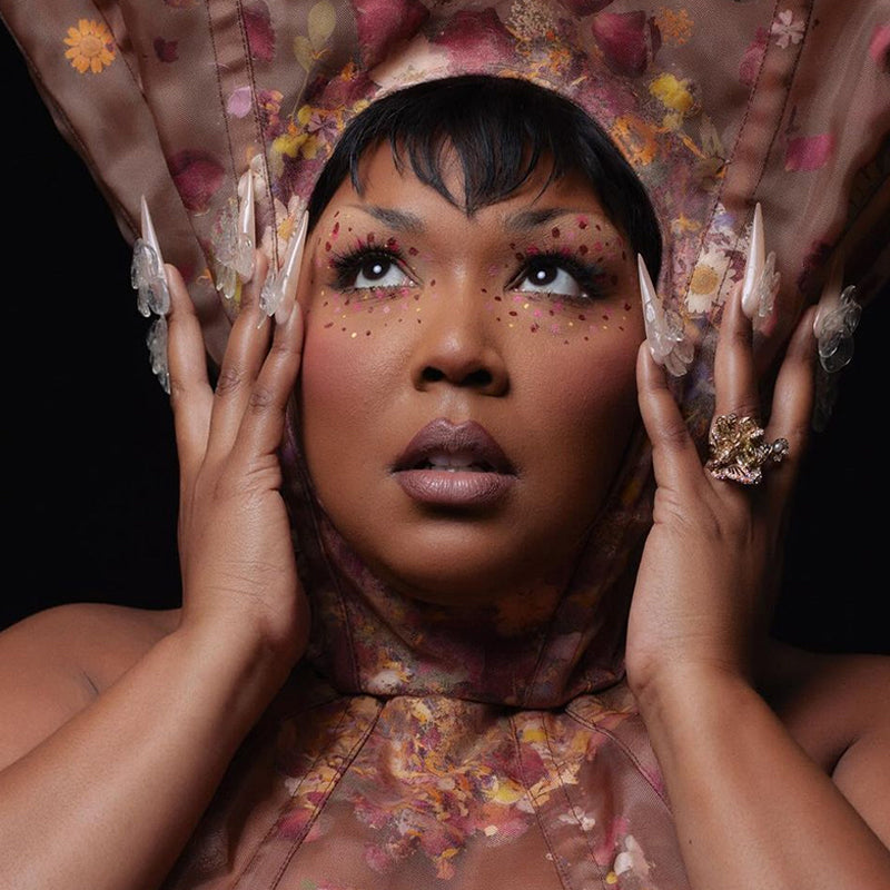 Lizzo wears the Iconic Canary Peony Butterfly Ring x 2024 Met Gala ...
